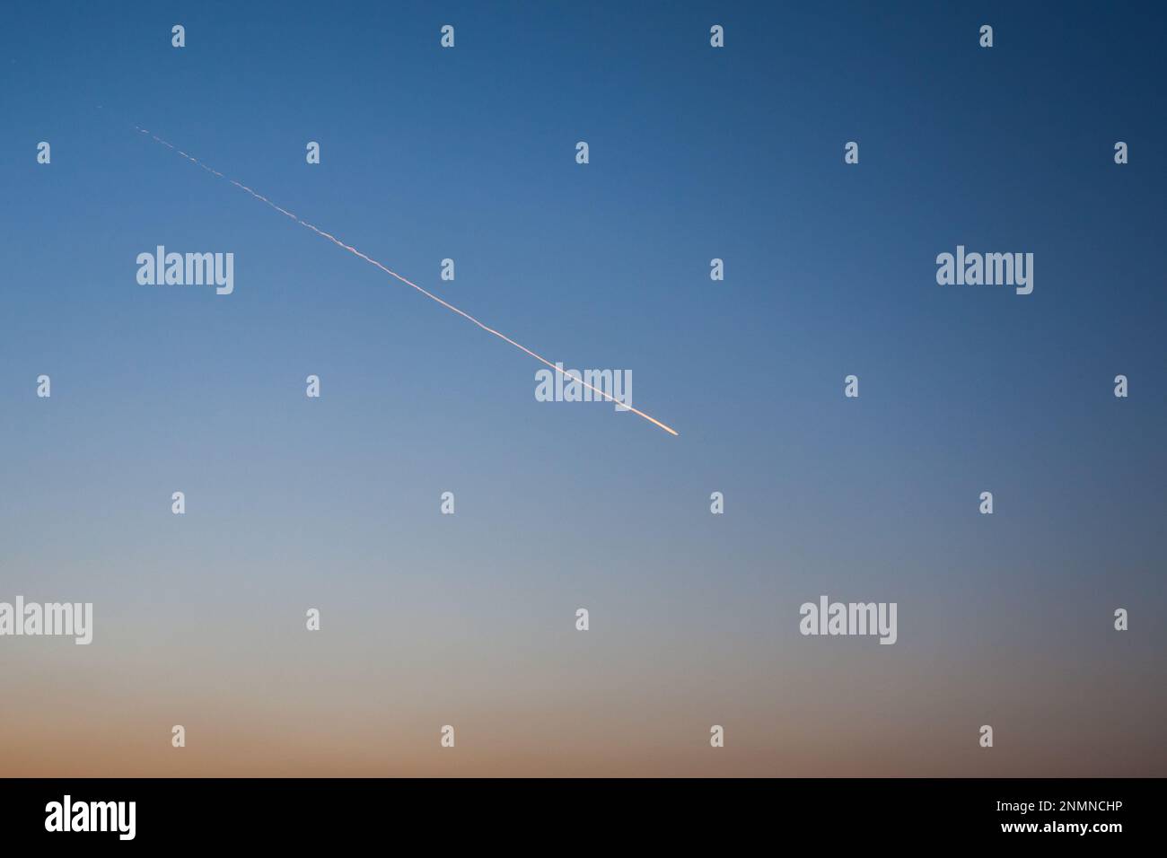 The trace of the plane in the sky, in the clear evening sky remained ...