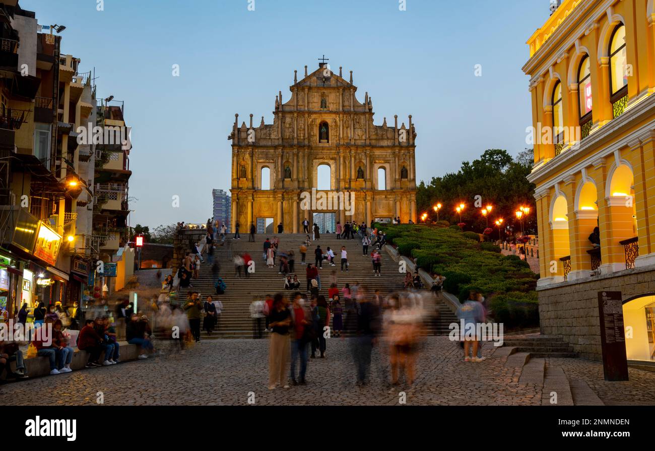 Tourists visiting the famous ruins of Sao Paulo cathedral, Macau, China ...