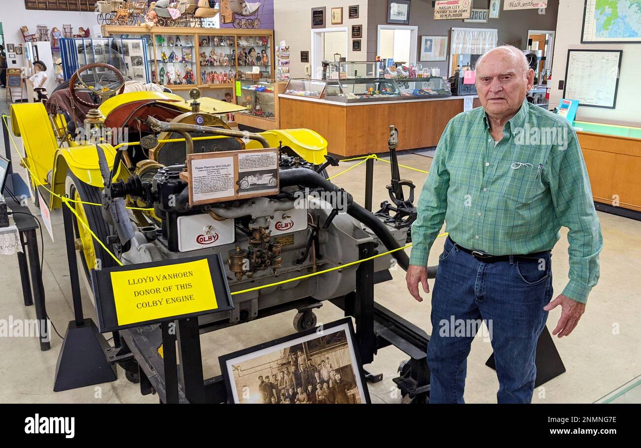 Lloyd Van Horn stands in August 2021 beside an engine, whose ...