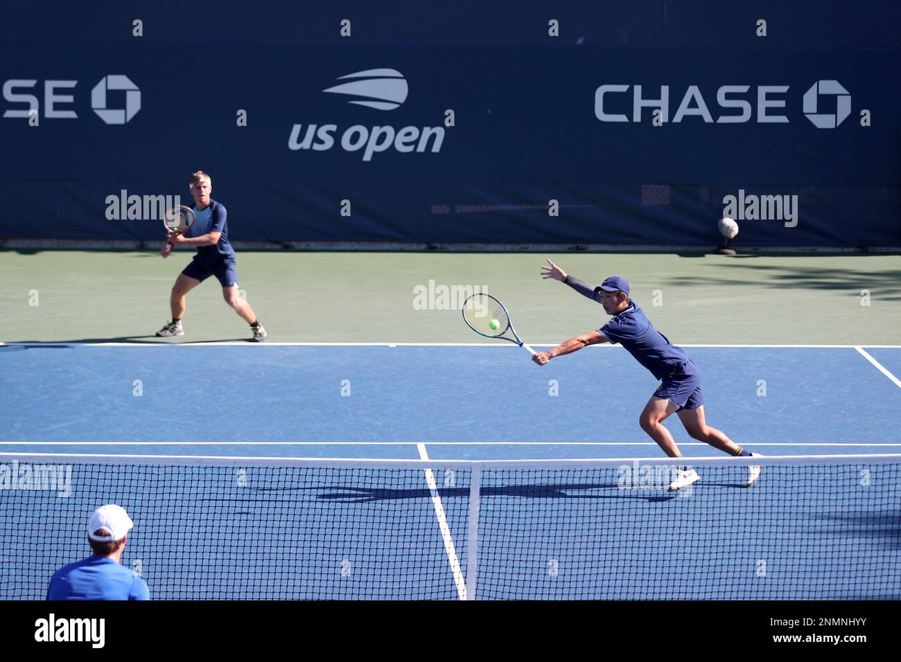 Matthew William Donald and Juncheng Shang in action during a Junior ...