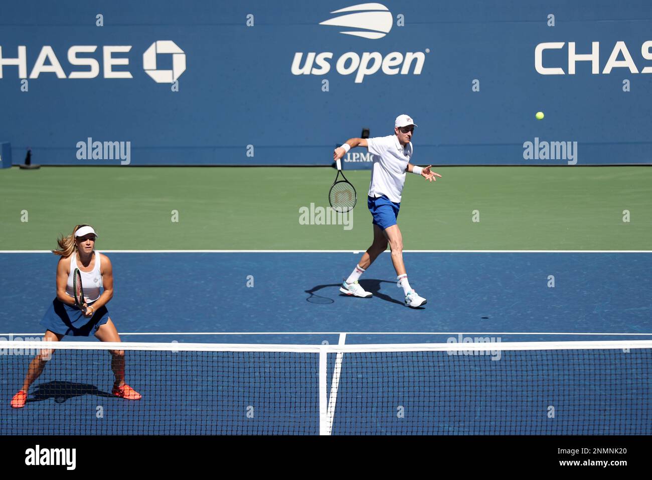 Ellen Perez and Marcelo Demoliner in action during a Mixed Doubles match at the 2021 US Open ...