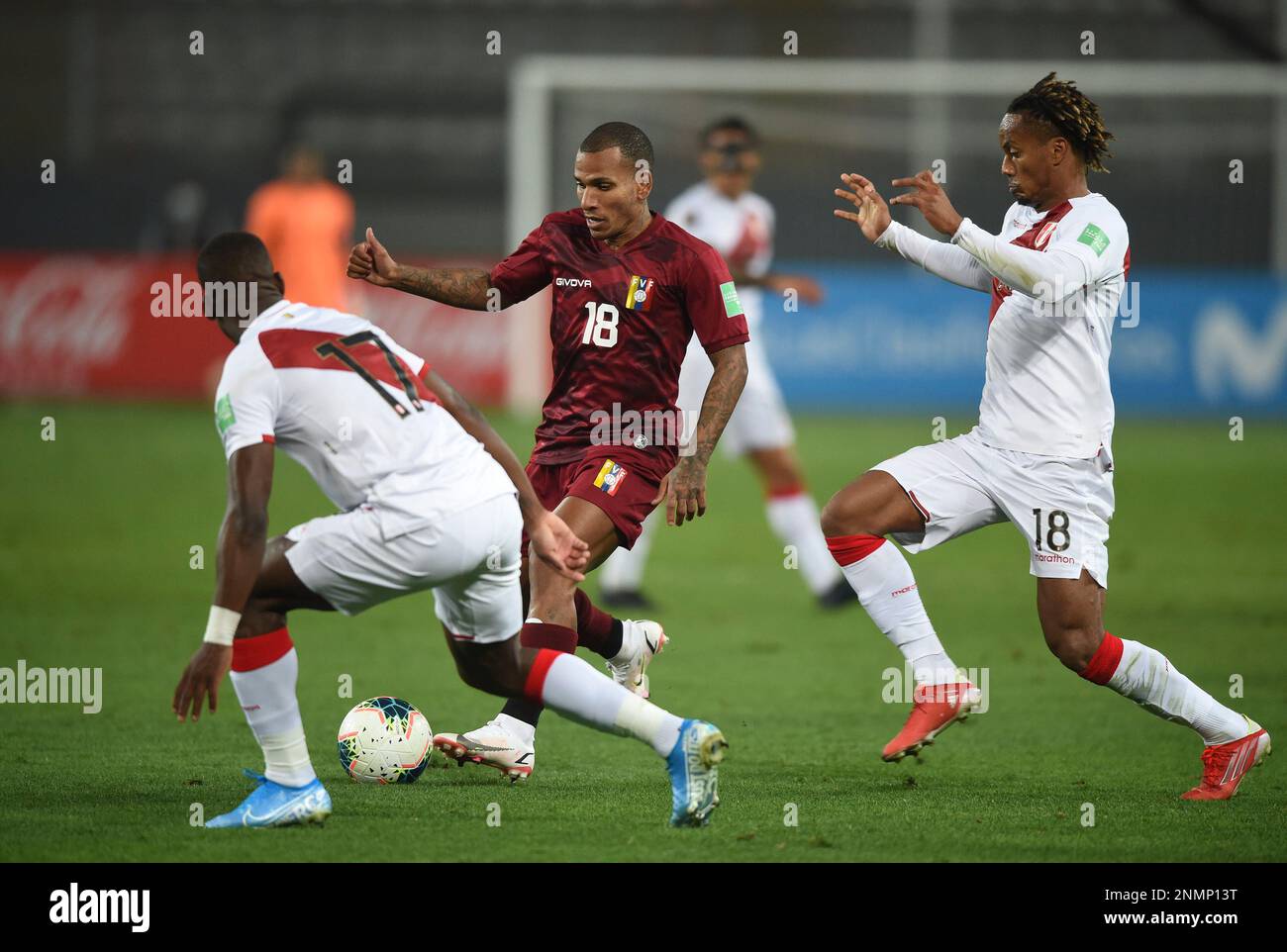 Venezuela's Romulo Otero, center, controls the ball during a qualifying ...