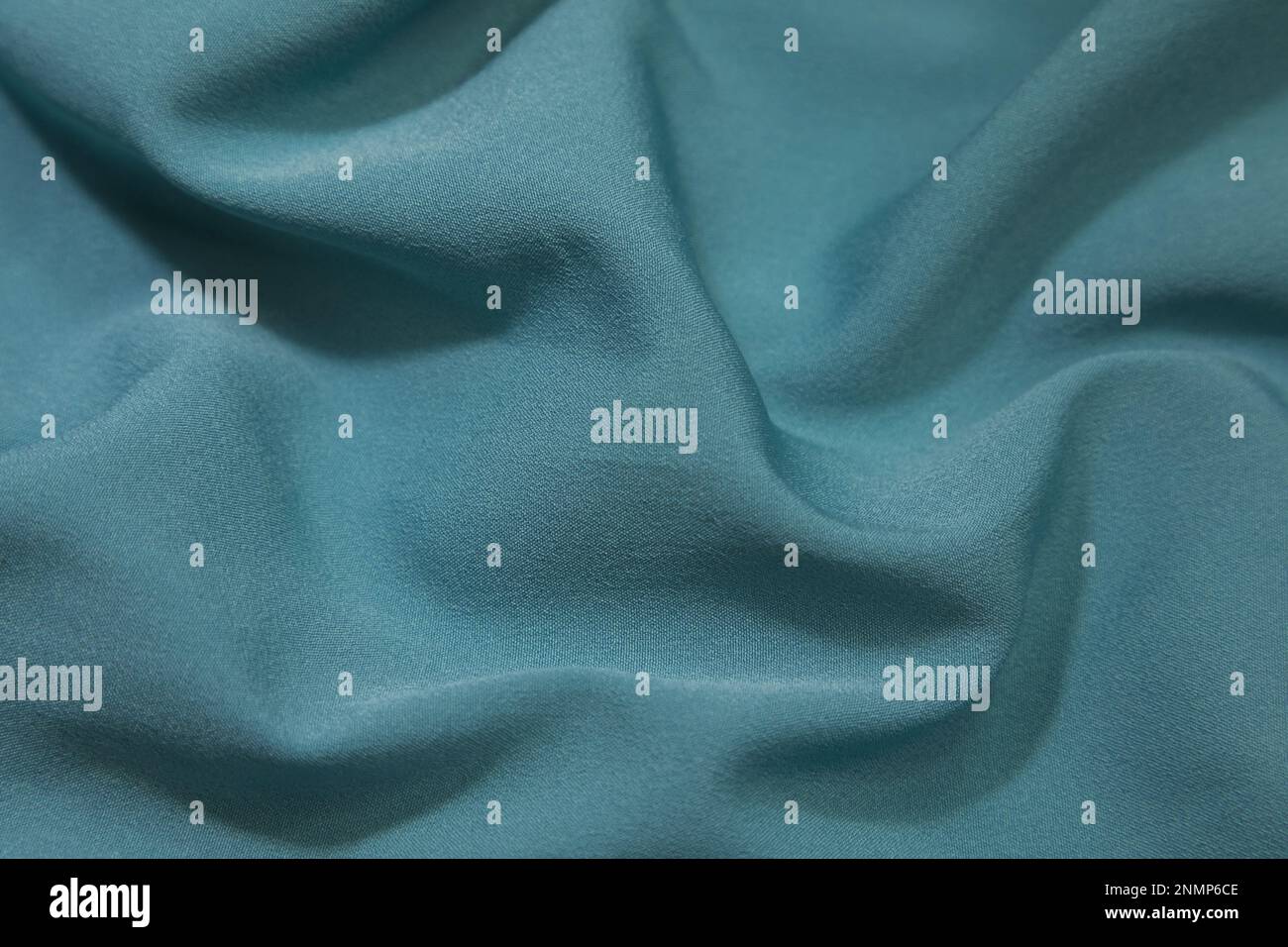 Turquoise fabric background. Turquoise cloth waves background texture ...