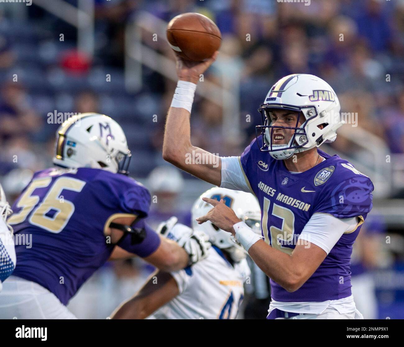 James Madison quarterback Cole Johnson (12) throws a pass during the ...