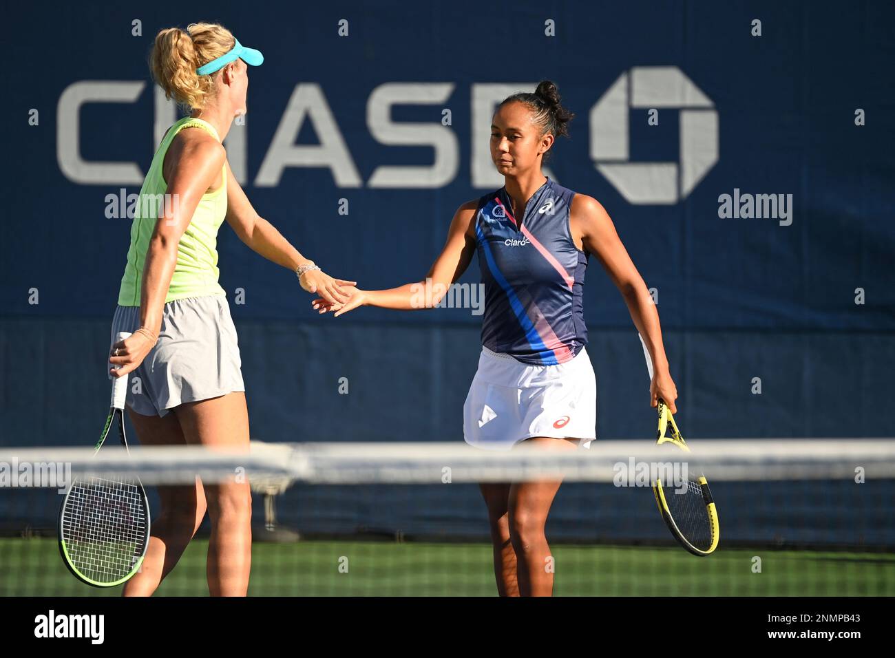 Leila Fernandez high fives Erin Routliffe during a Women's Doubles ...