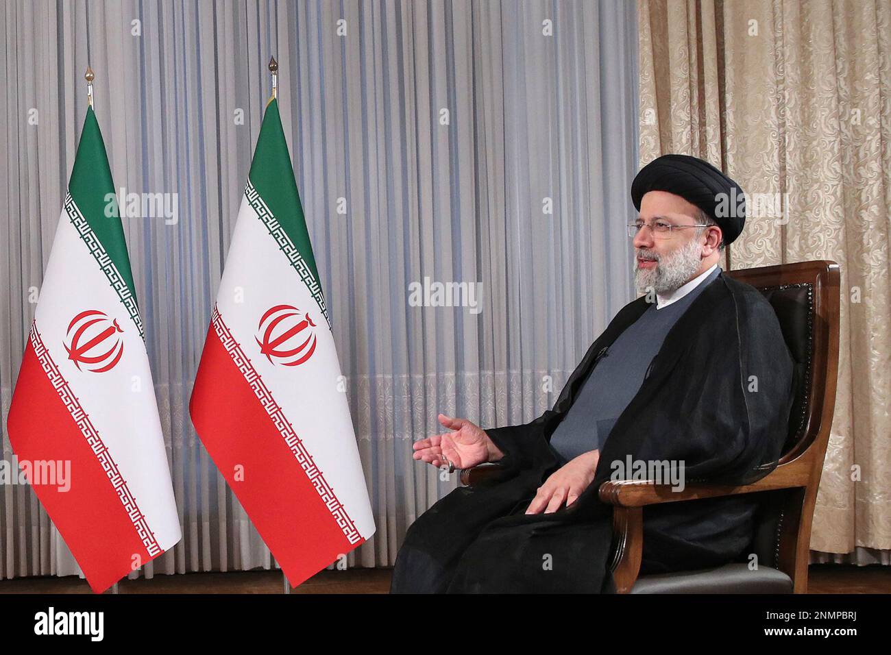 In this photo released by the official website of the office of the ...