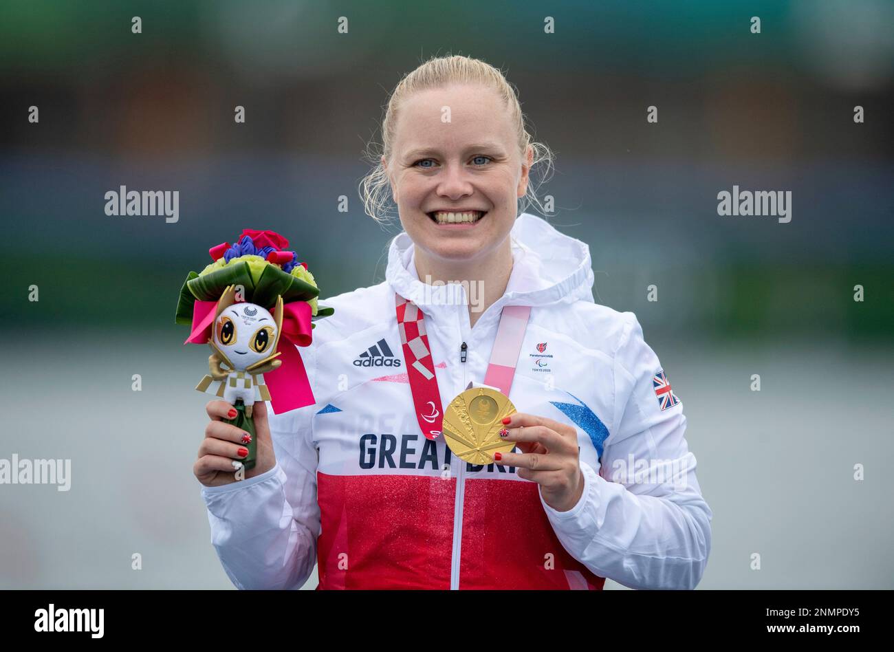 Great Britain's gold medalist Laura Sugar displays her medal on the ...