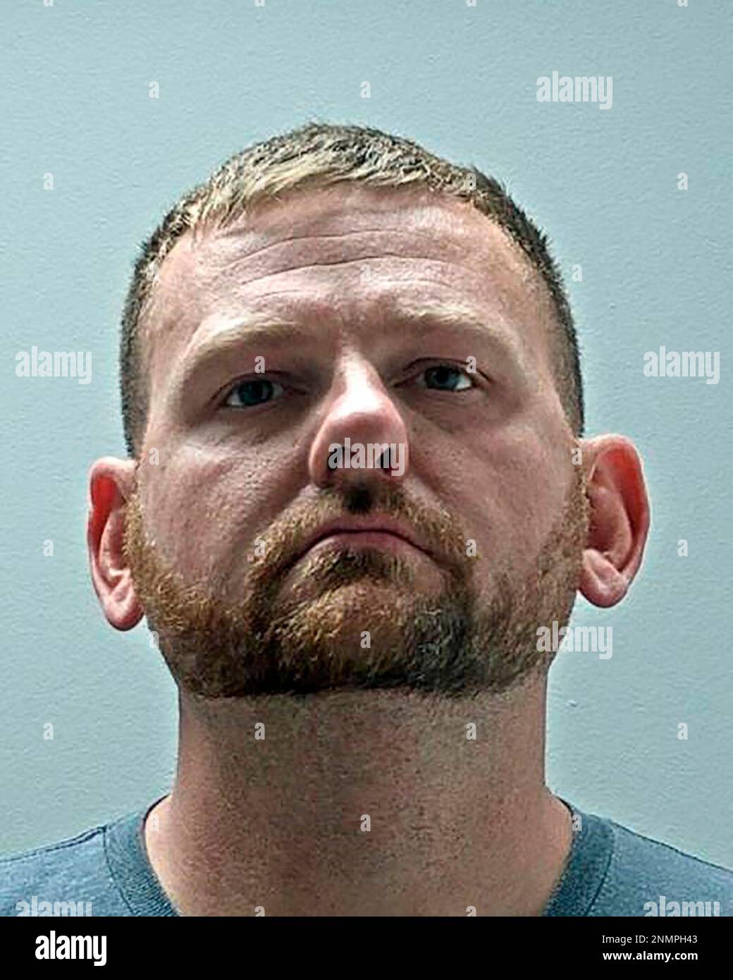 This undated booking photo provided by the Glendale Police Department ...