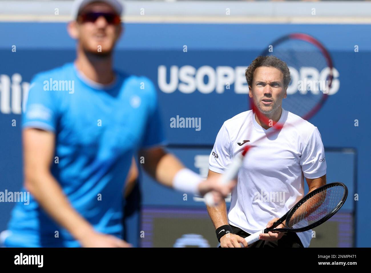 Bruno Soares and Jamie Murray during a Men's Doubles match at the 2021 ...