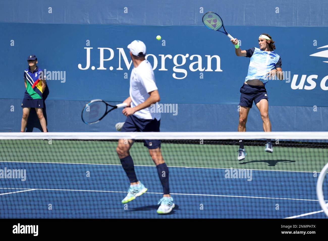 Lloyd Harris returns a shot during a Men's Doubles match at the 2021 US ...