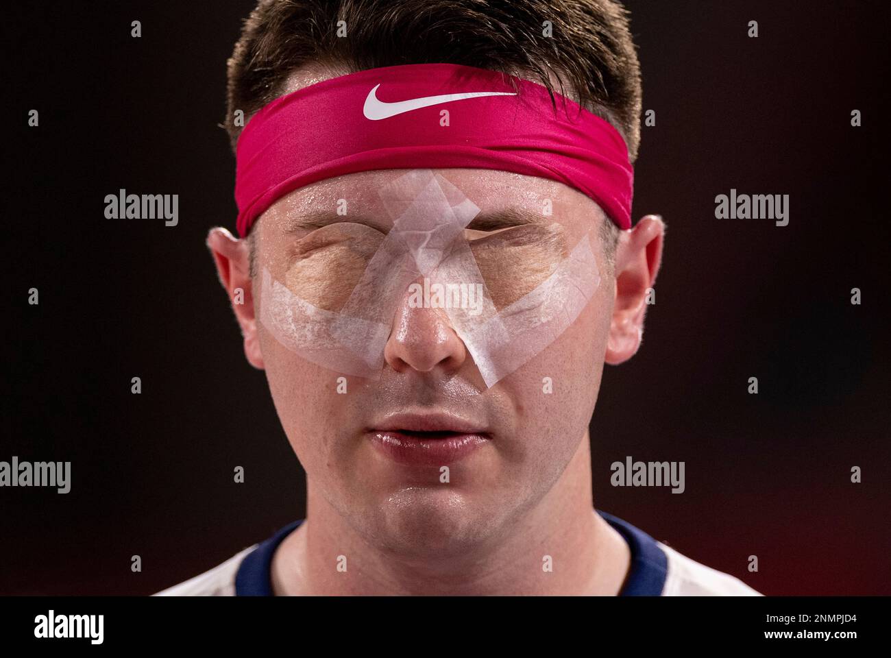 USA's Calahan Young without his eye-covering mask competes during the ...