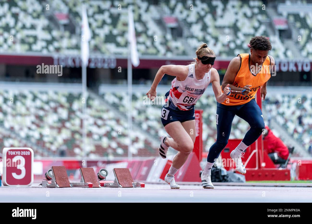 Libby Clegg of Britain and her guide Chris Clarke of Britain lead off ...