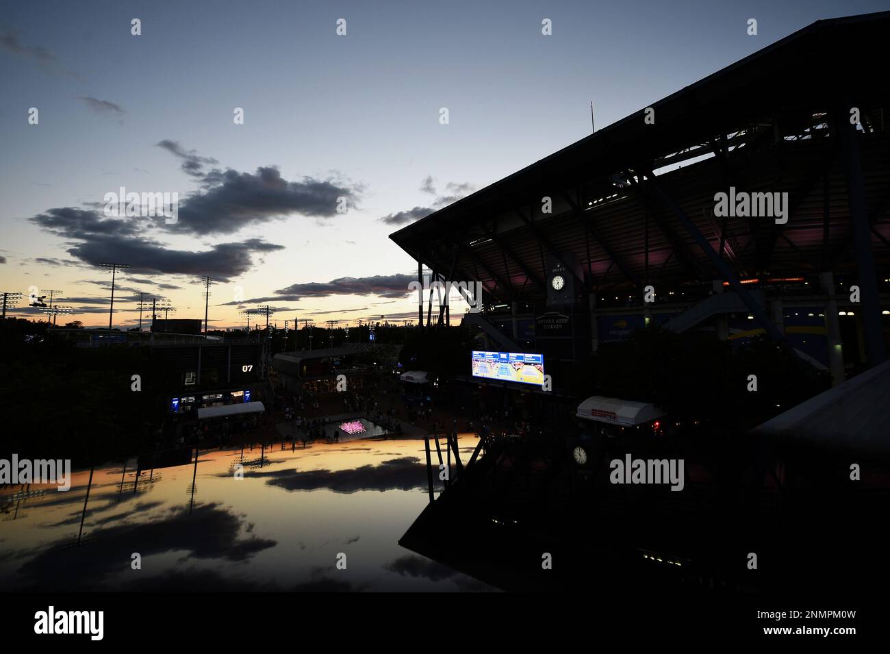 The sun sets around the grounds at the 2021 US Open, Thursday, Sep. 2 ...