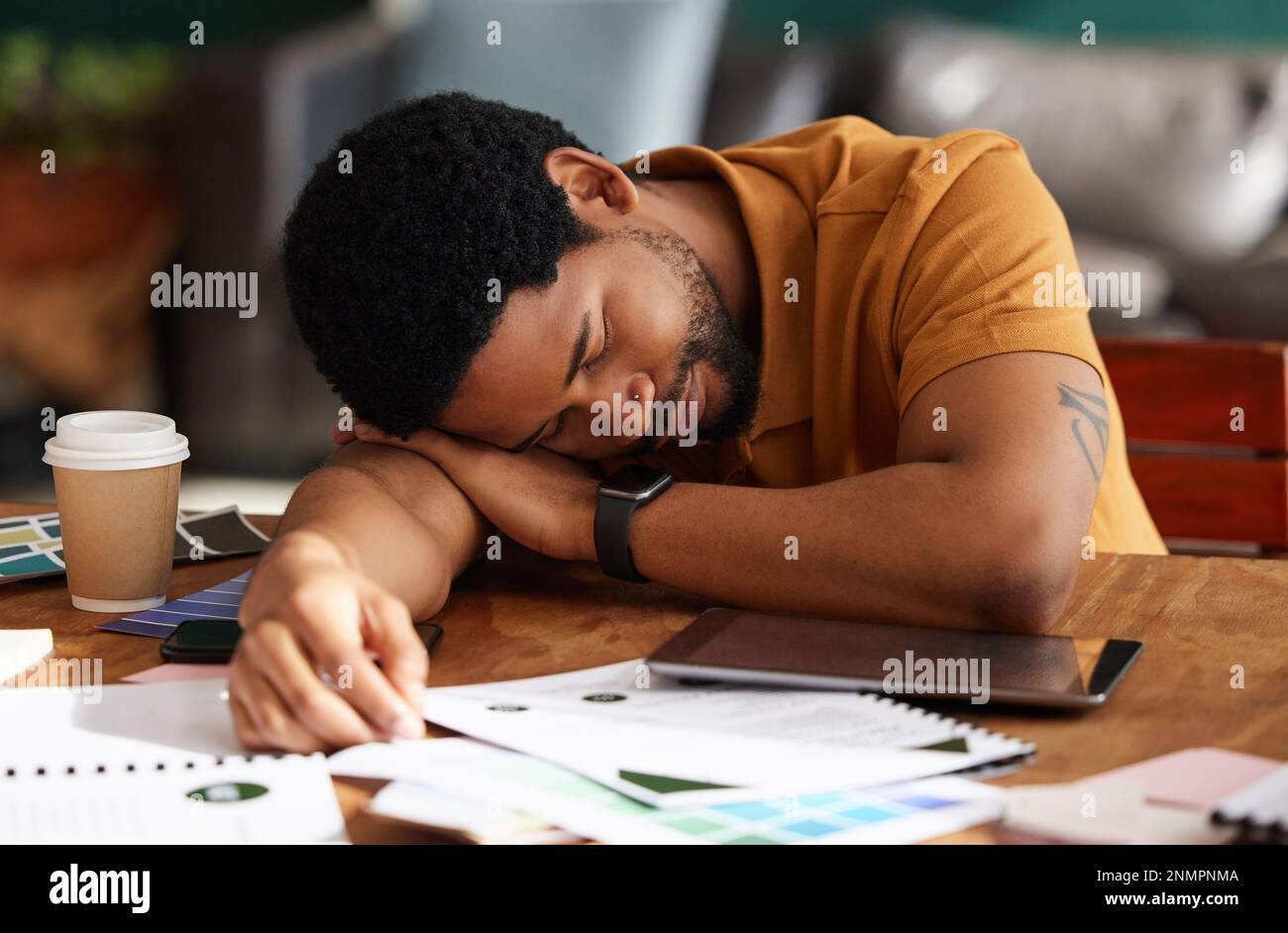 Tired, exhausted and man sleeping in the office while working on a ...