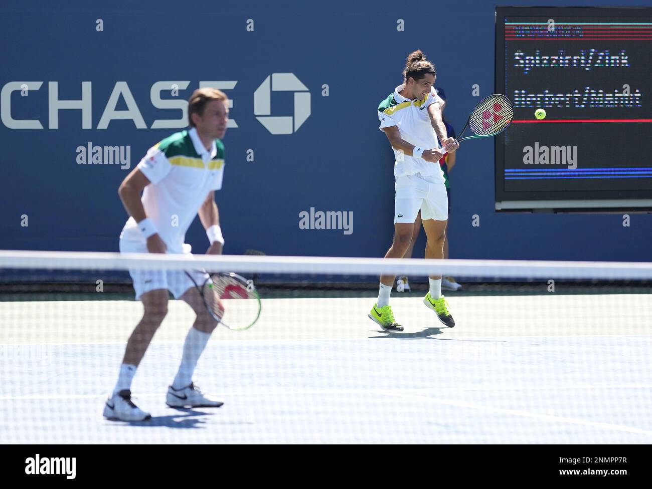 Pierre-Hugues Herbert hits a backhand during a Men's Doubles match at ...