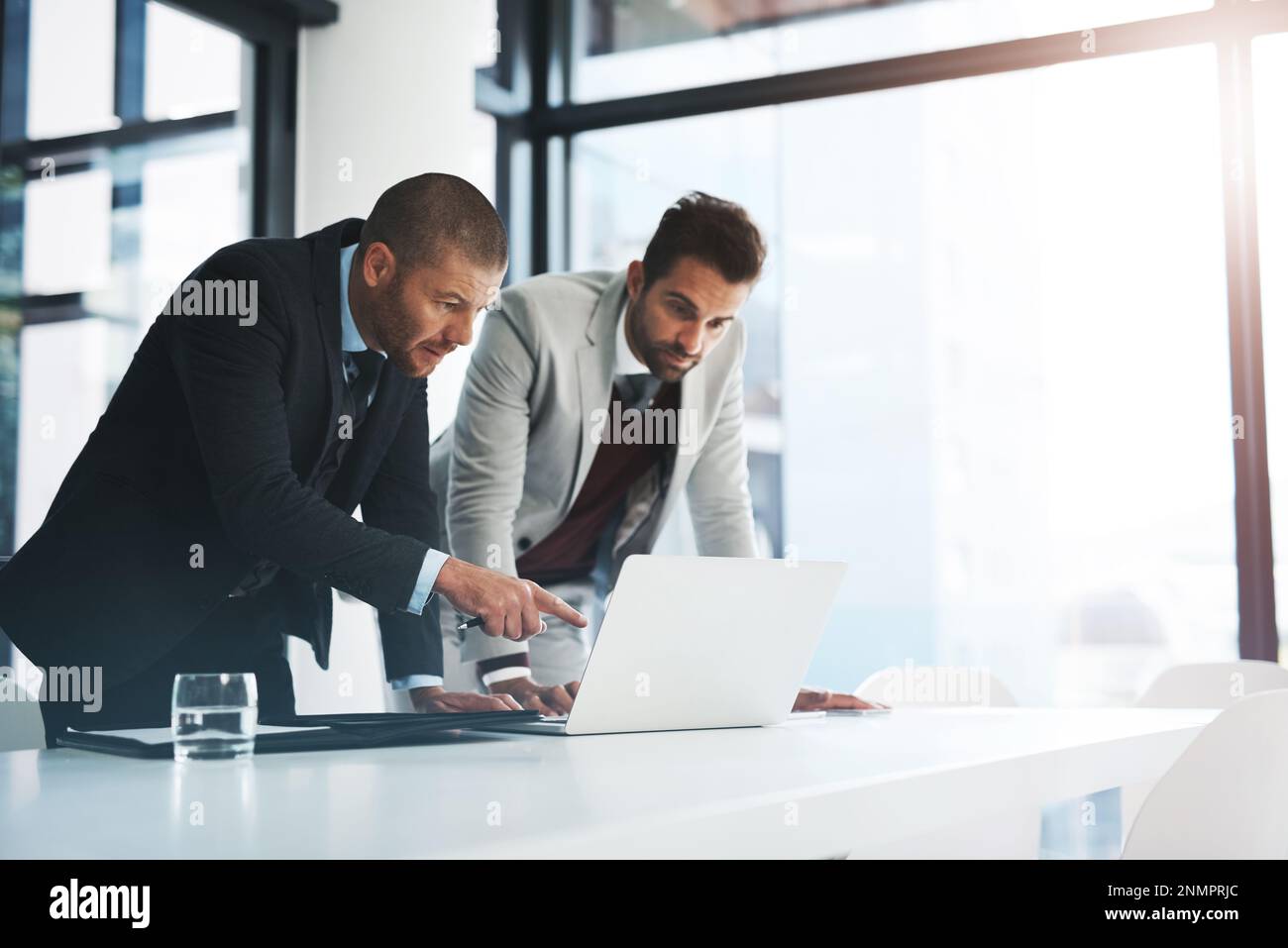 We should look into this again. businesspeople working together in the ...