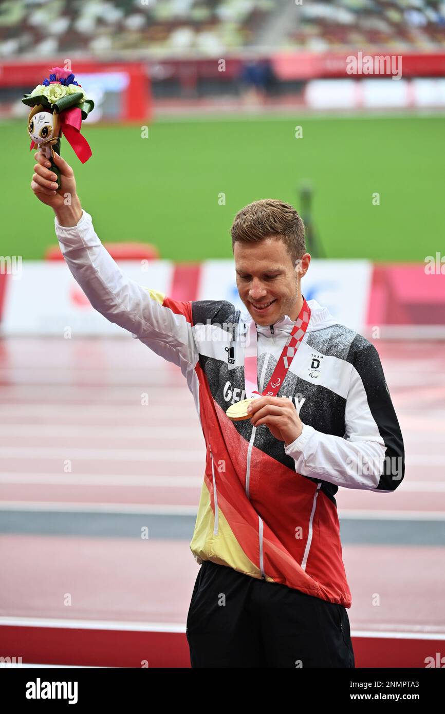 Germany's REHM Markusm, the gold medalist, attends a victory ceremony ...