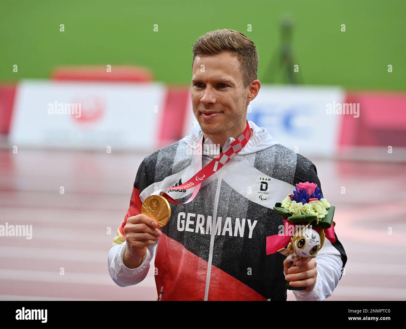 Germany's REHM Markusm, the gold medalist, attends a victory ceremony ...