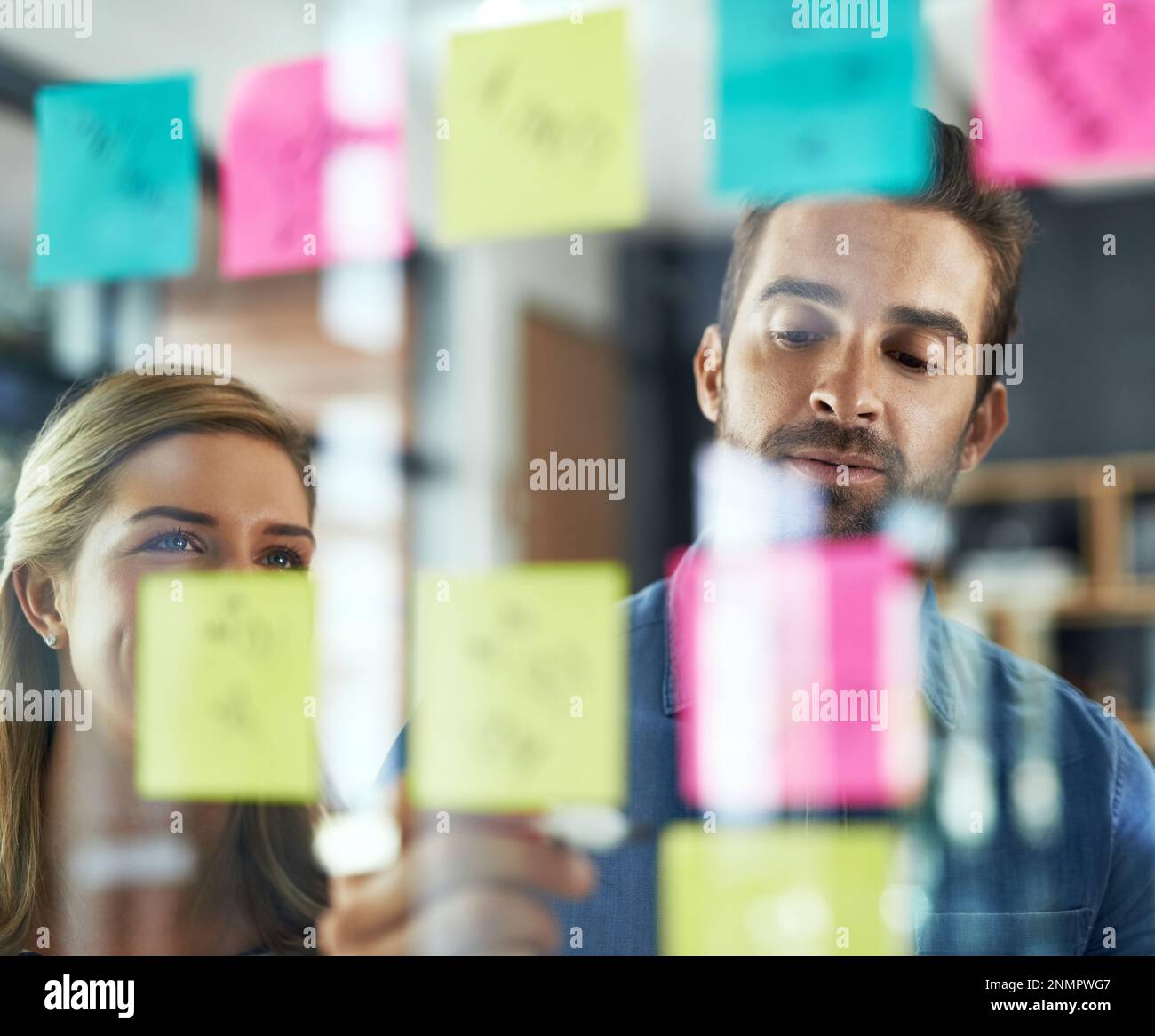 The makings of a great marketing strategy. two colleagues having a ...
