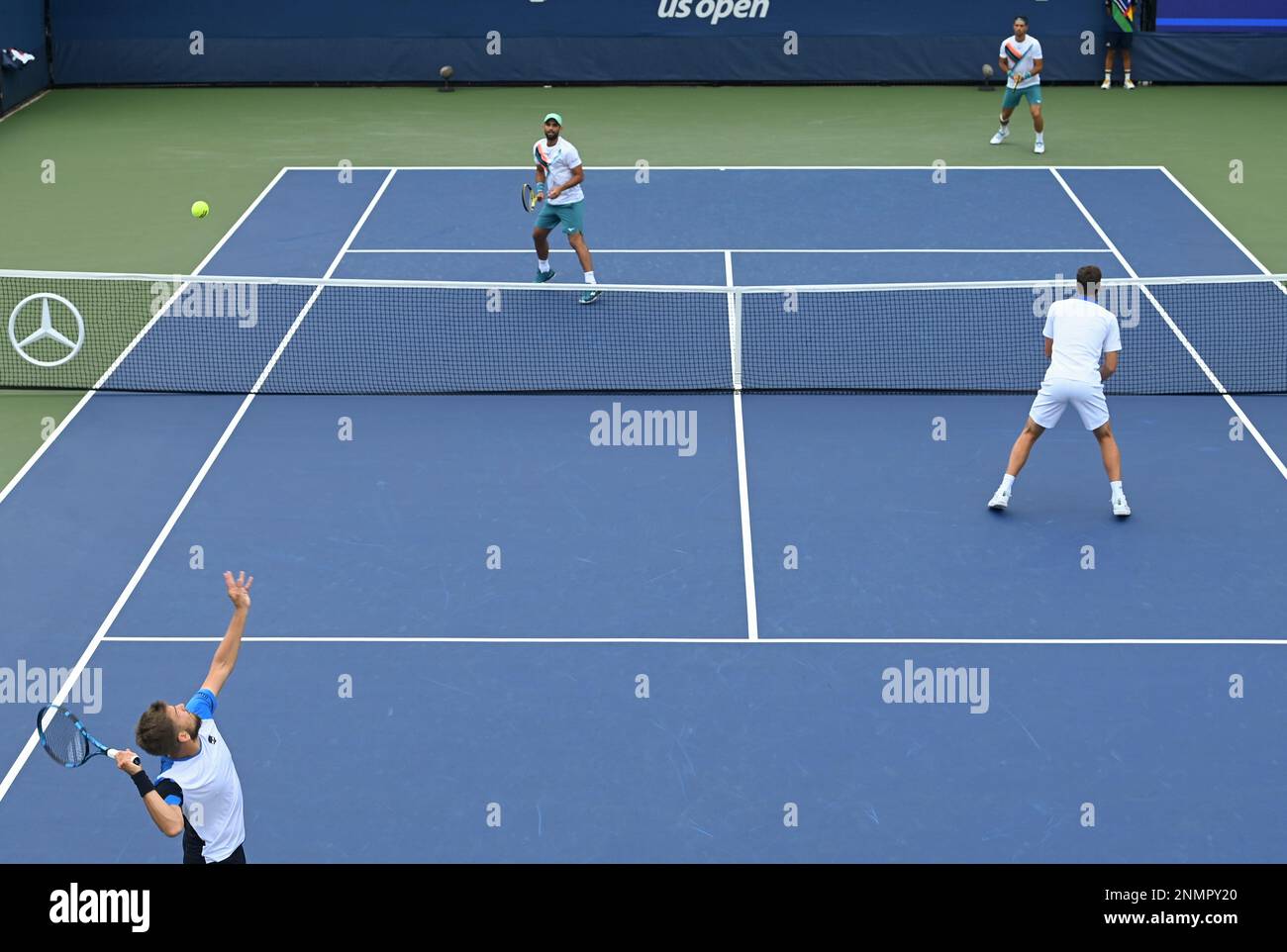 Hubert Hurkacz and Szymon Walkow serve against Juan Sebastian Cabal and ...