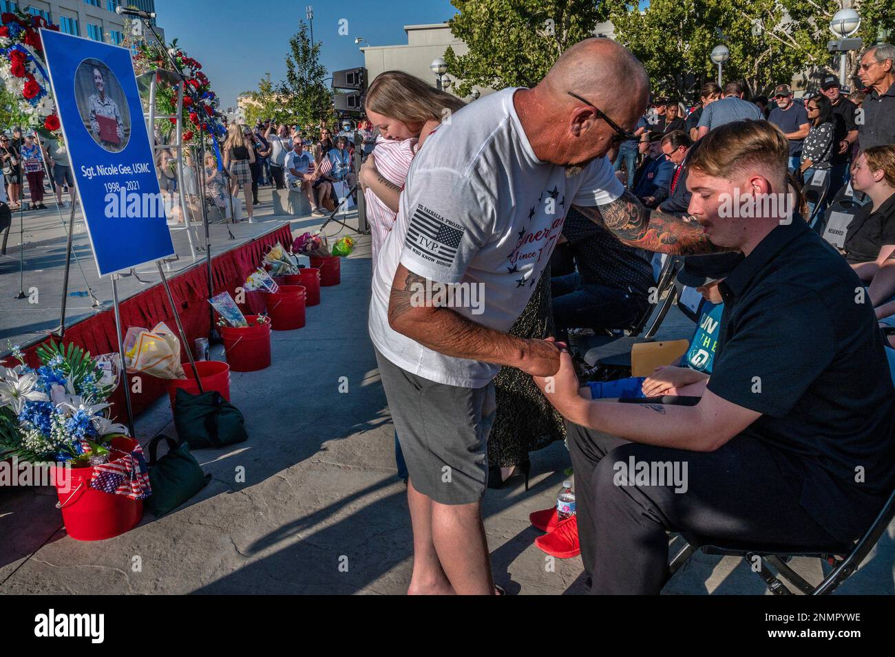 Jarod Gee, right, whose wife Marine Sgt. Nicole Gee died in a bombing ...