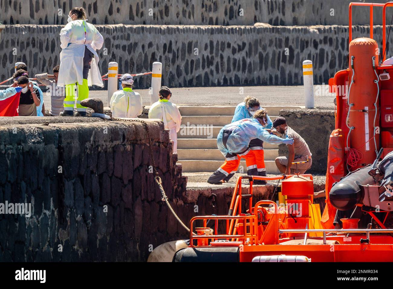 One of the 34 migrants travelling on the skiff, on their arrival at La ...