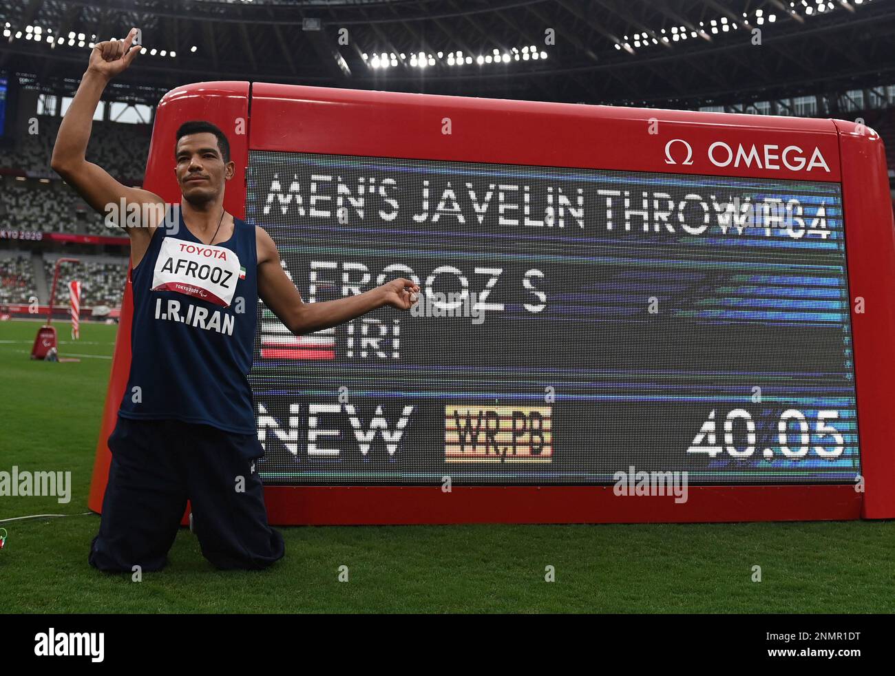 AFROOZ Saeid of Iran poses with the electric board showing the world ...