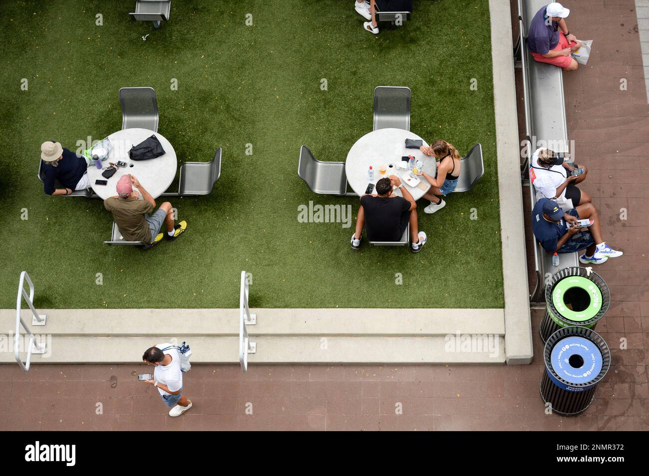 Fans eat dinner around the grounds at the 2021 US Open, Tuesday, Aug ...