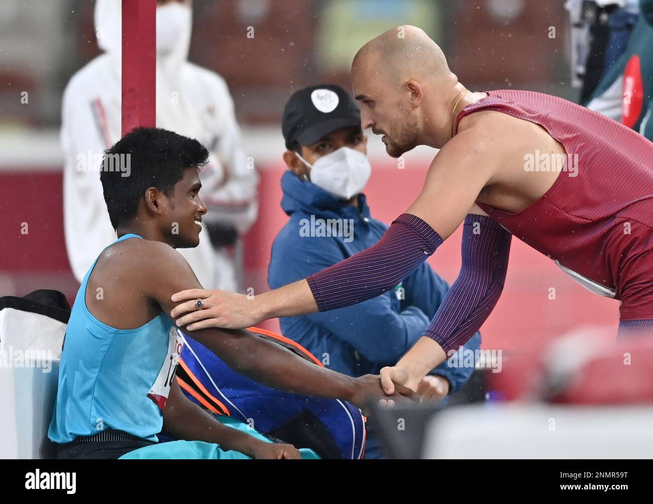 GREWE Sam of the U.S.A shakes hands with a competitor after winning the ...