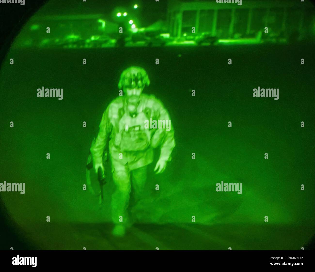 In this image made through a night vision scope and provided by the U.S ...