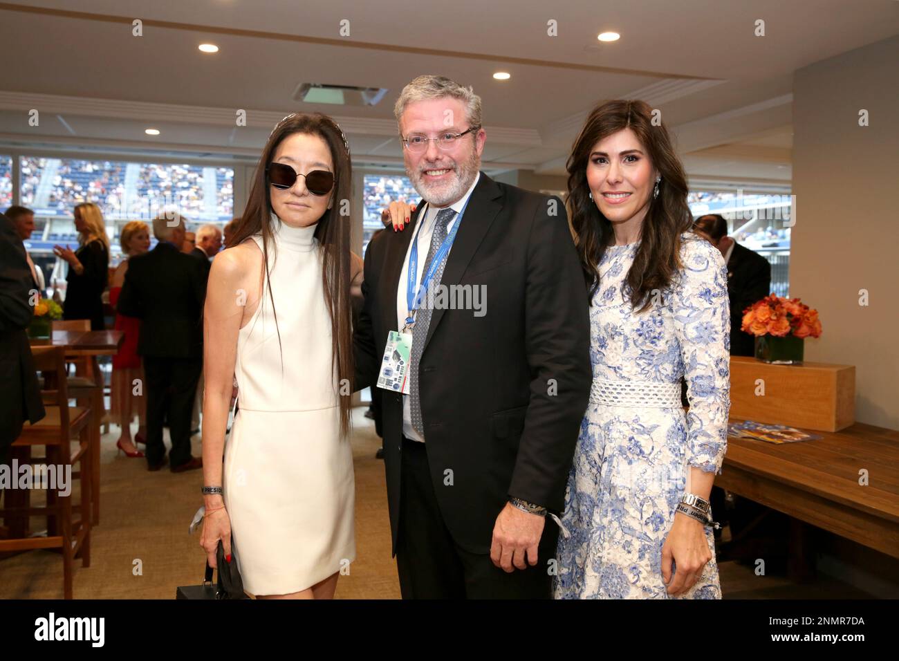 From left, Vera Wang, Y. David Scharf and Cheryl Scharf at the USTA ...