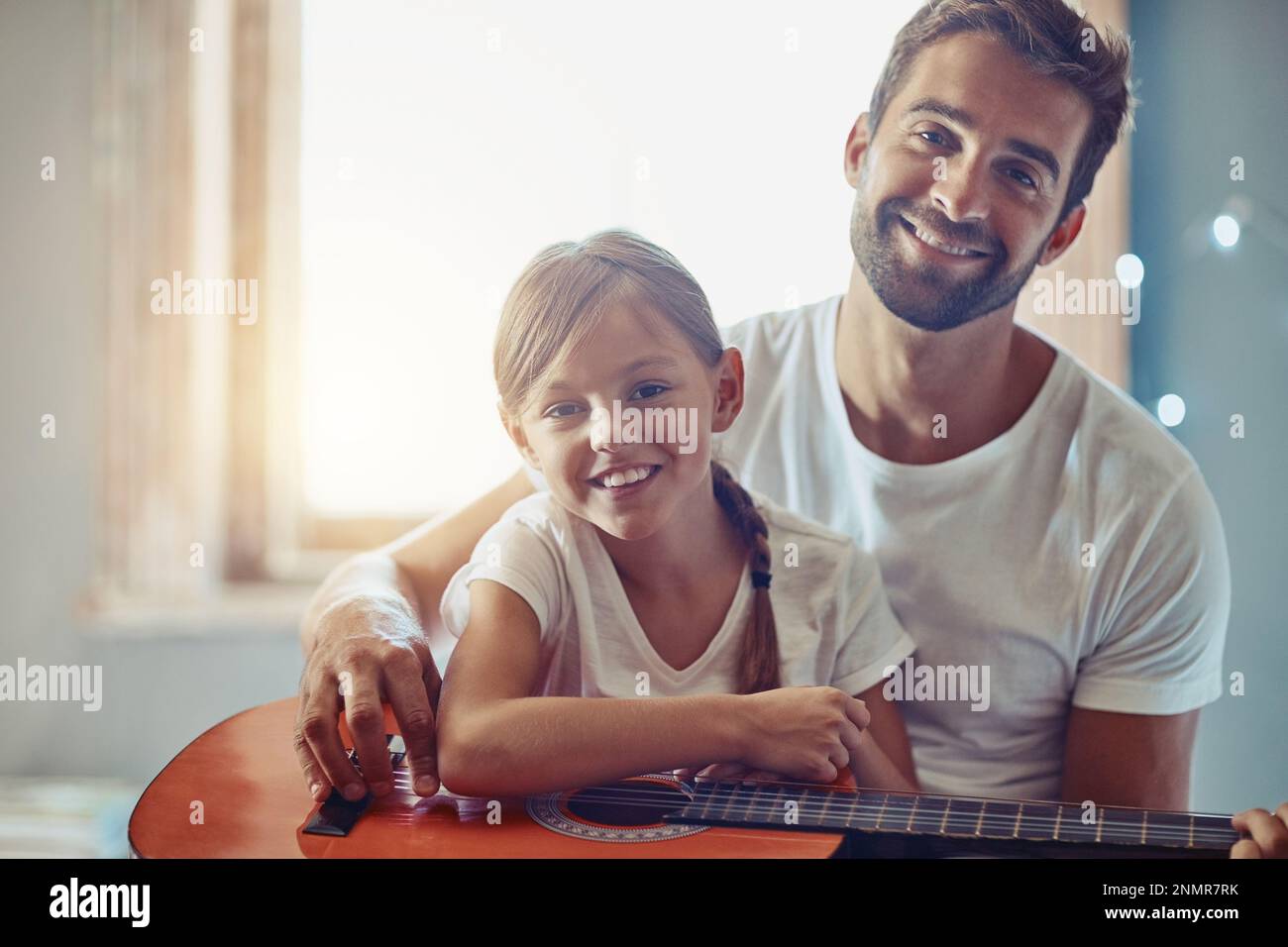 Shes my inspiration. a little girl playing the guitar with her father ...