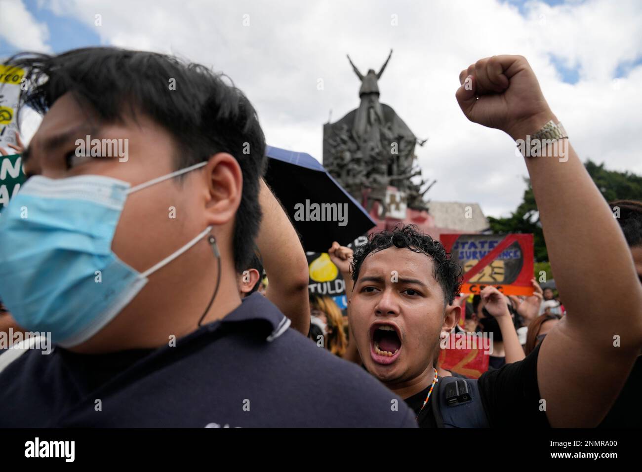 Protesters shout slogans during a rally to observe the 37th anniversary ...