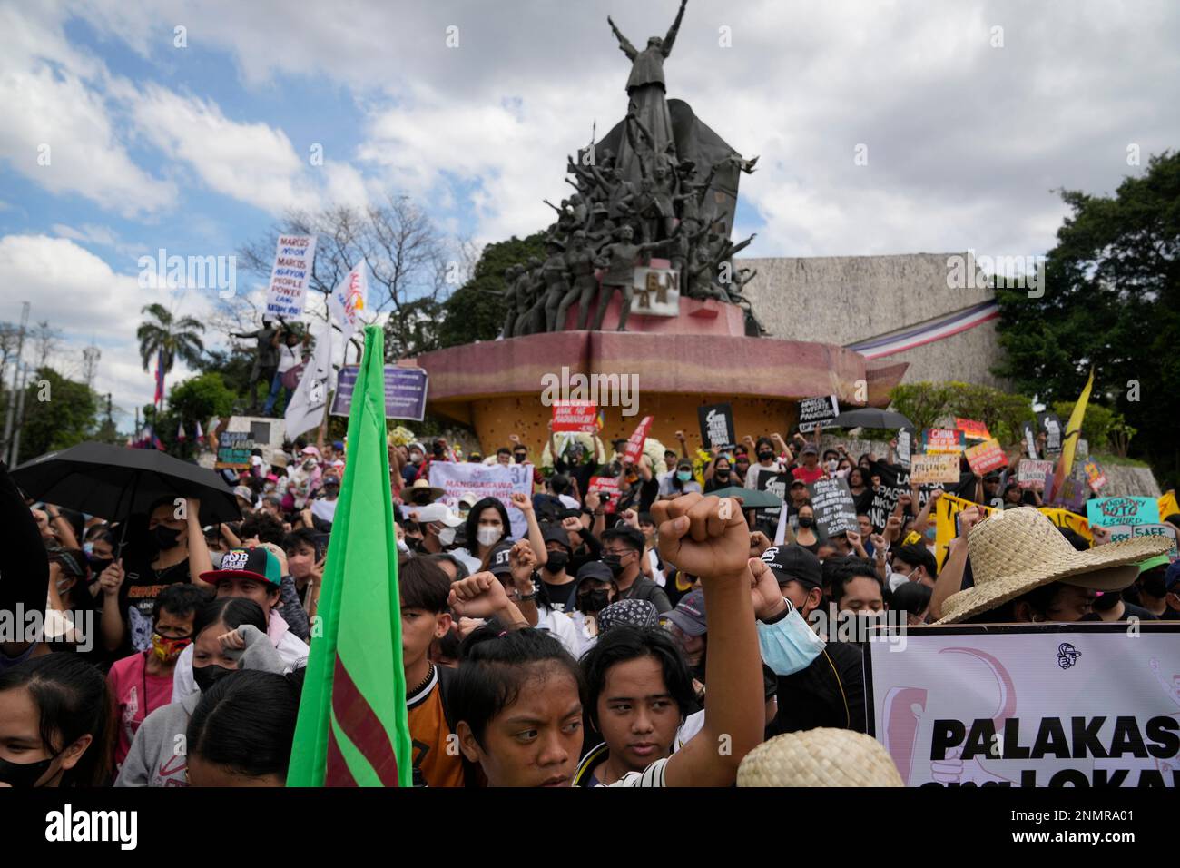 Protesters chant slogans during a rally to observe the 37th anniversary ...