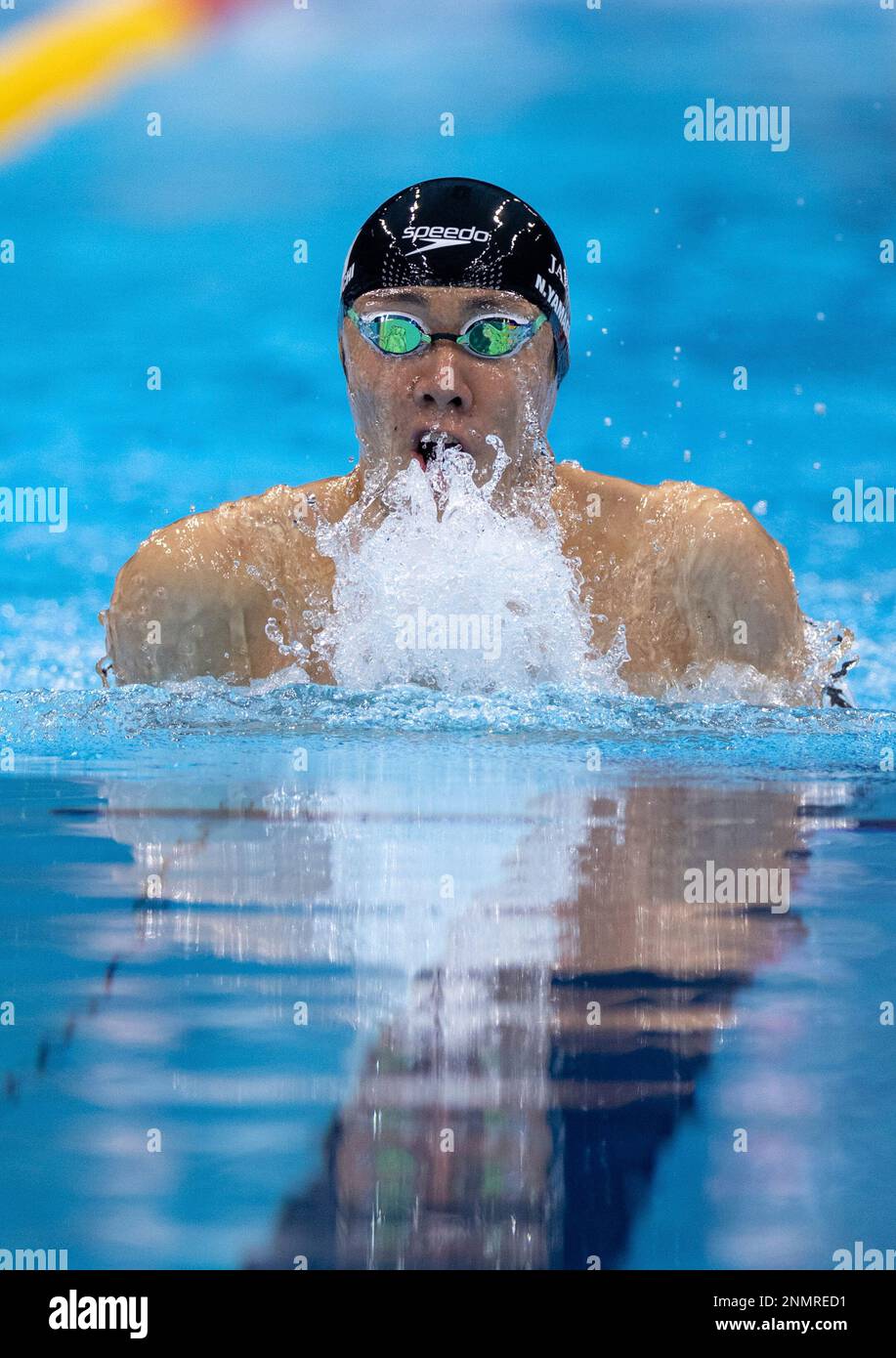 Naohide Yamaguchi of Japan competes in the men's swimming 100-meter ...
