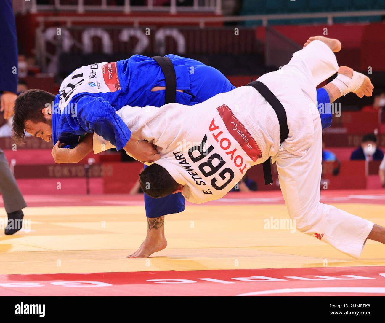 Iran's NOURI Vahid (blue) and Great Britain's STEWART Elliot competes ...