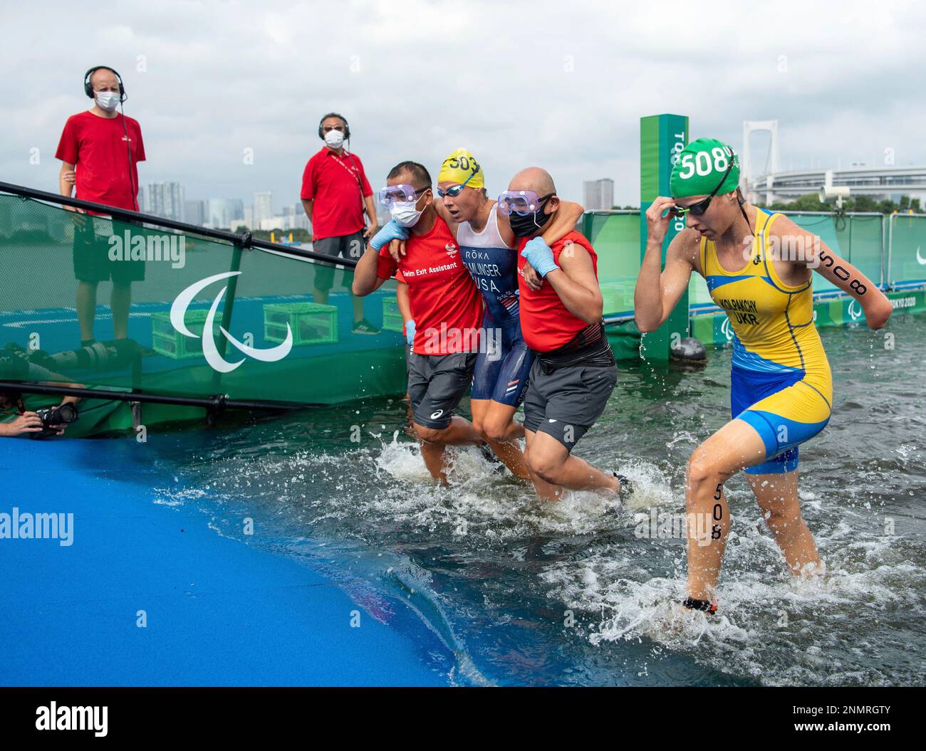 United States' Kelly Elmlinger is helped to exit the water during the ...