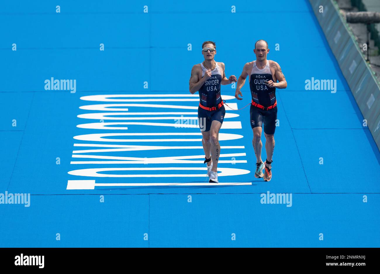 United States' Brad Snyder, left, and his guide Greg Billington ...