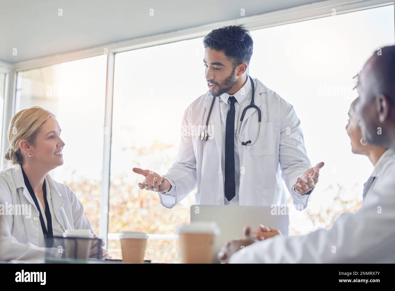 Indian doctor, medical collaboration and discussion in a hospital ...