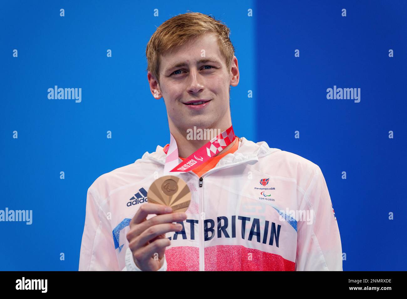 Stephen Clegg of Britain poses with his bronze medal during the medal ...