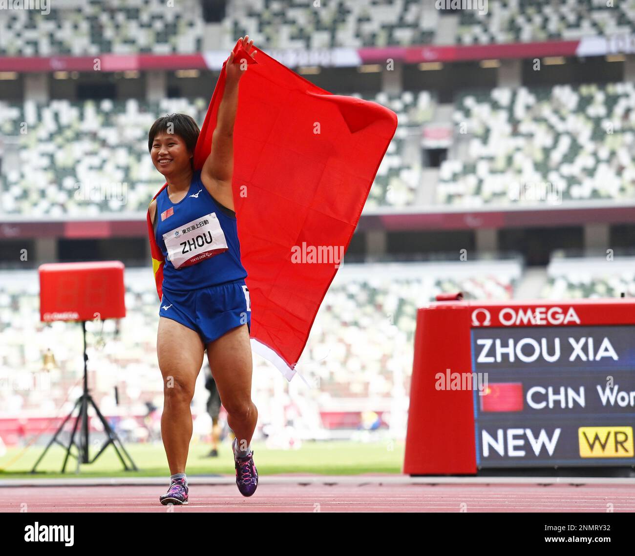 ZHOU Xia of China reacts after winning Athletics women's 100m – T35 during Tokyo 2020 Summer ...