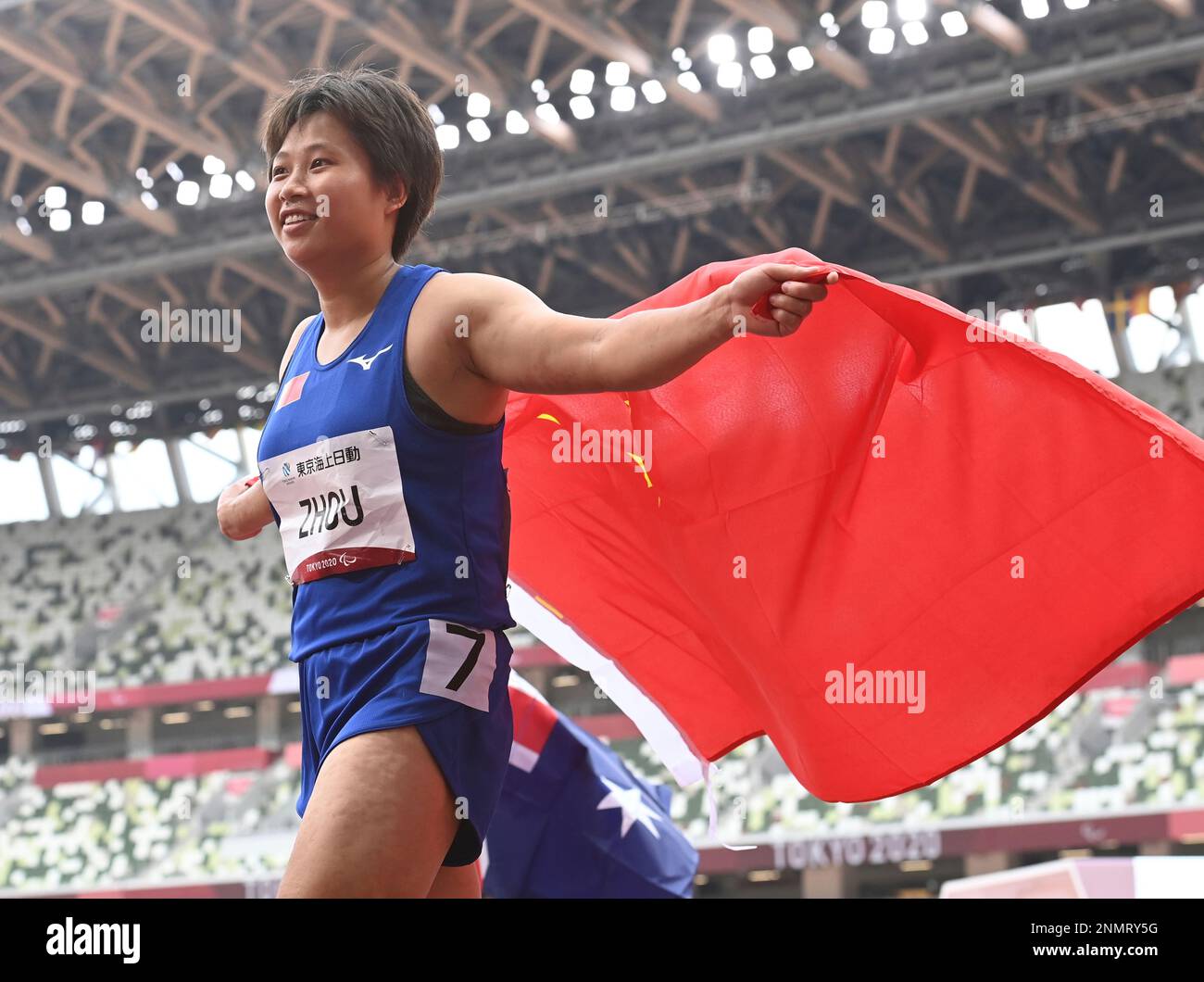 ZHOU Xia of China reacts after winning Athletics women's 100m – T35 ...
