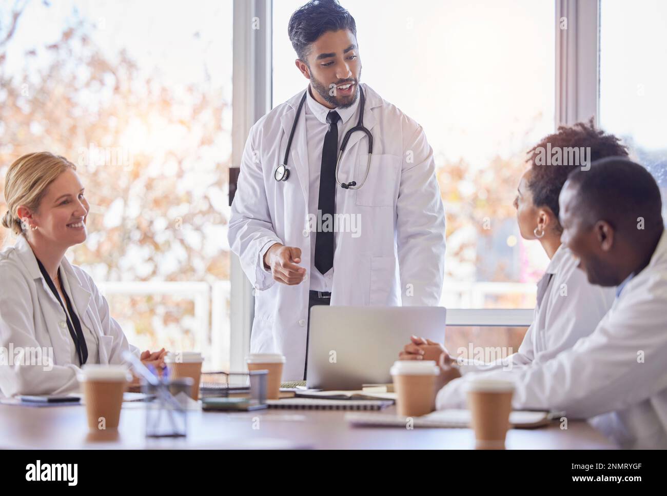 Indian doctor, medical collaboration and discussion in a hospital ...