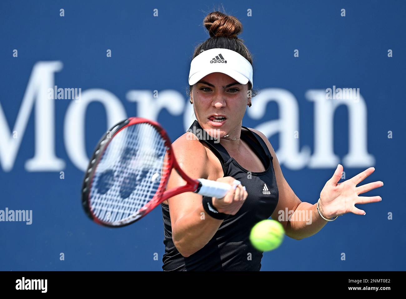 Elena-Gabriela Ruse returns a shot during a qualifying match at the ...