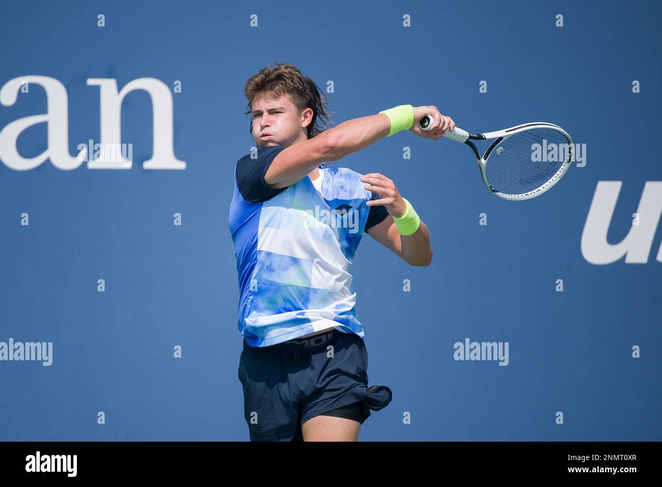J.J. Wolf returns a shot during a qualifying match at the 2021 US Open ...