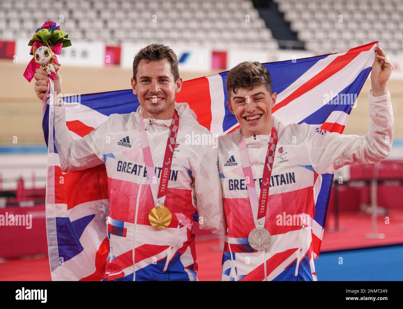Great Britain's gold medalist Jaco Van Gass, left, and silver medalist ...