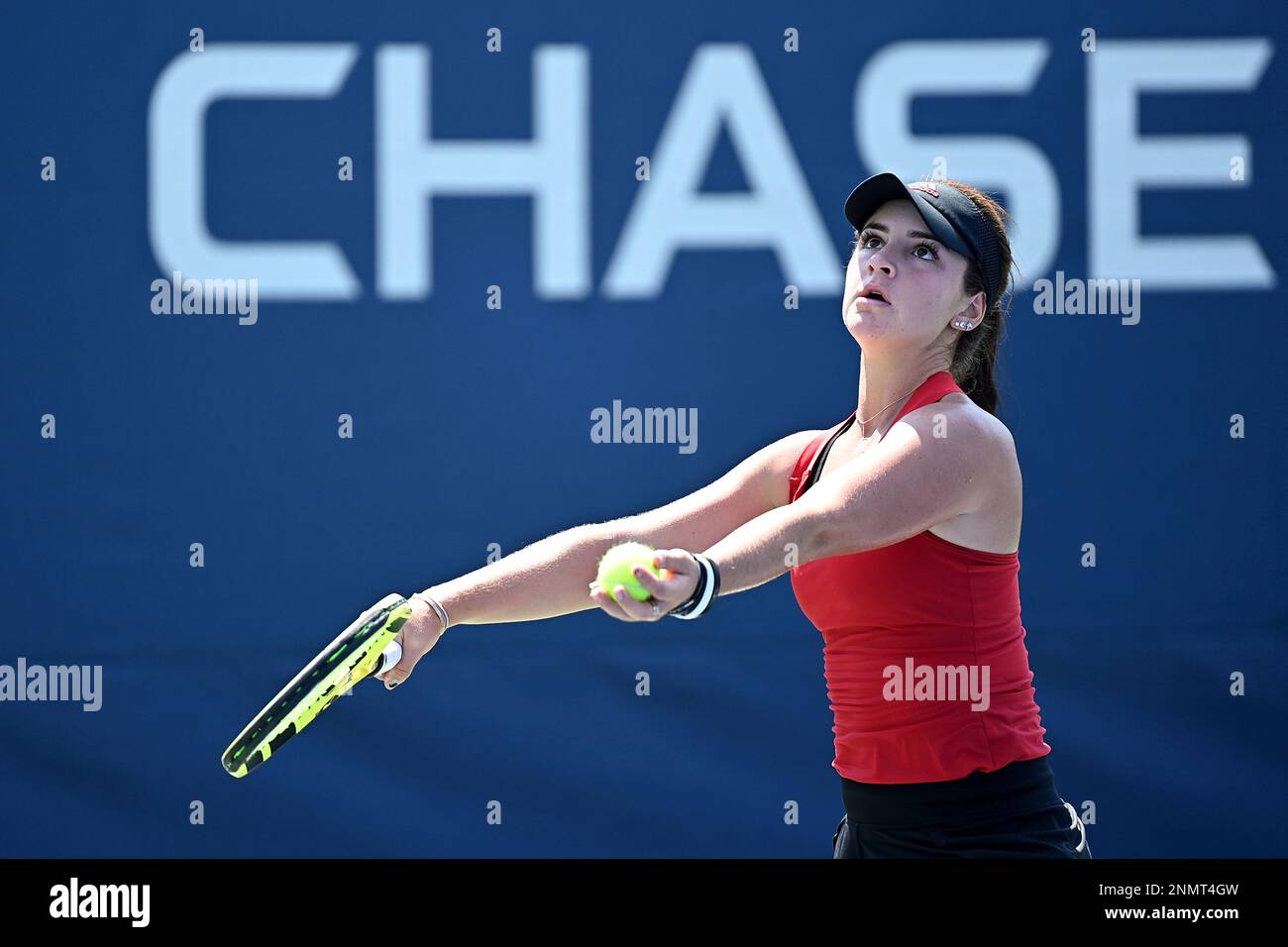 Gabriella Price serves during a qualifying match at the 2021 US Open ...