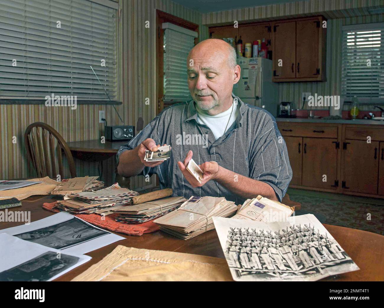 David Wassel, an attorney from White Oak, look at old letters Wednesday ...