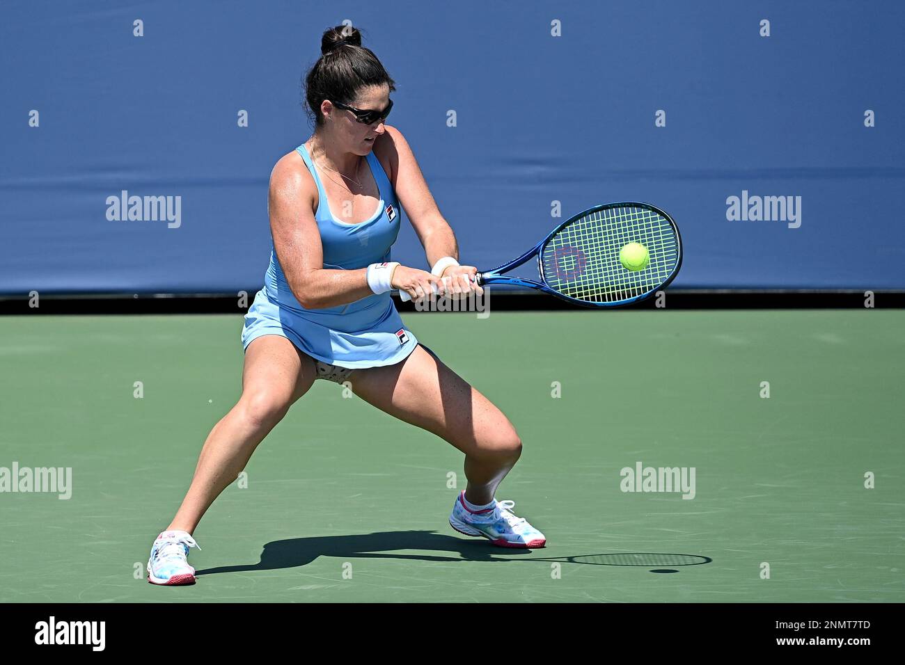 Jamie Loeb returns a shot during qualifying at the 2021 US Open ...