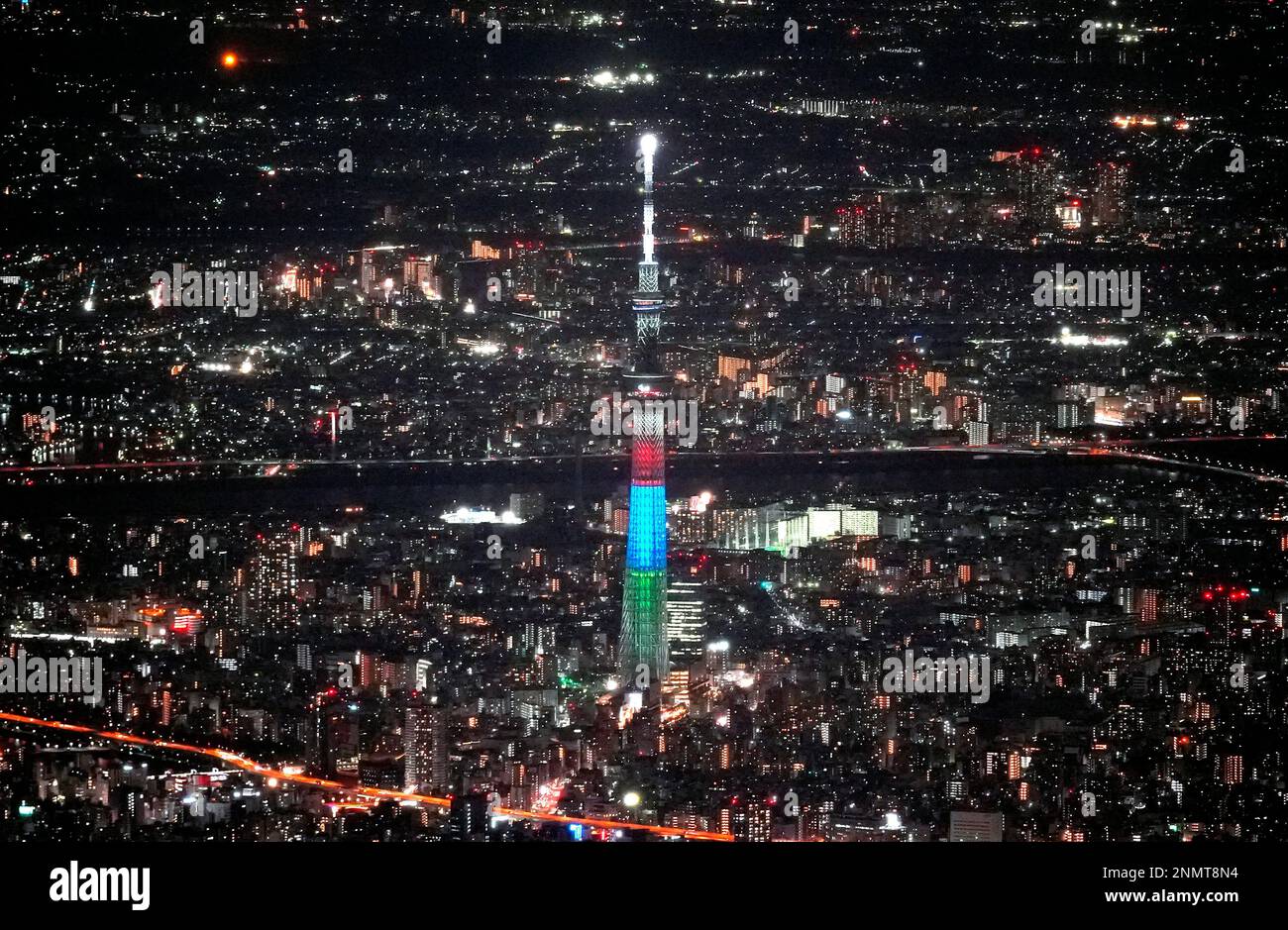 An aerial photo shows Tokyo Skytree lit up with Paralympic colors ahead ...